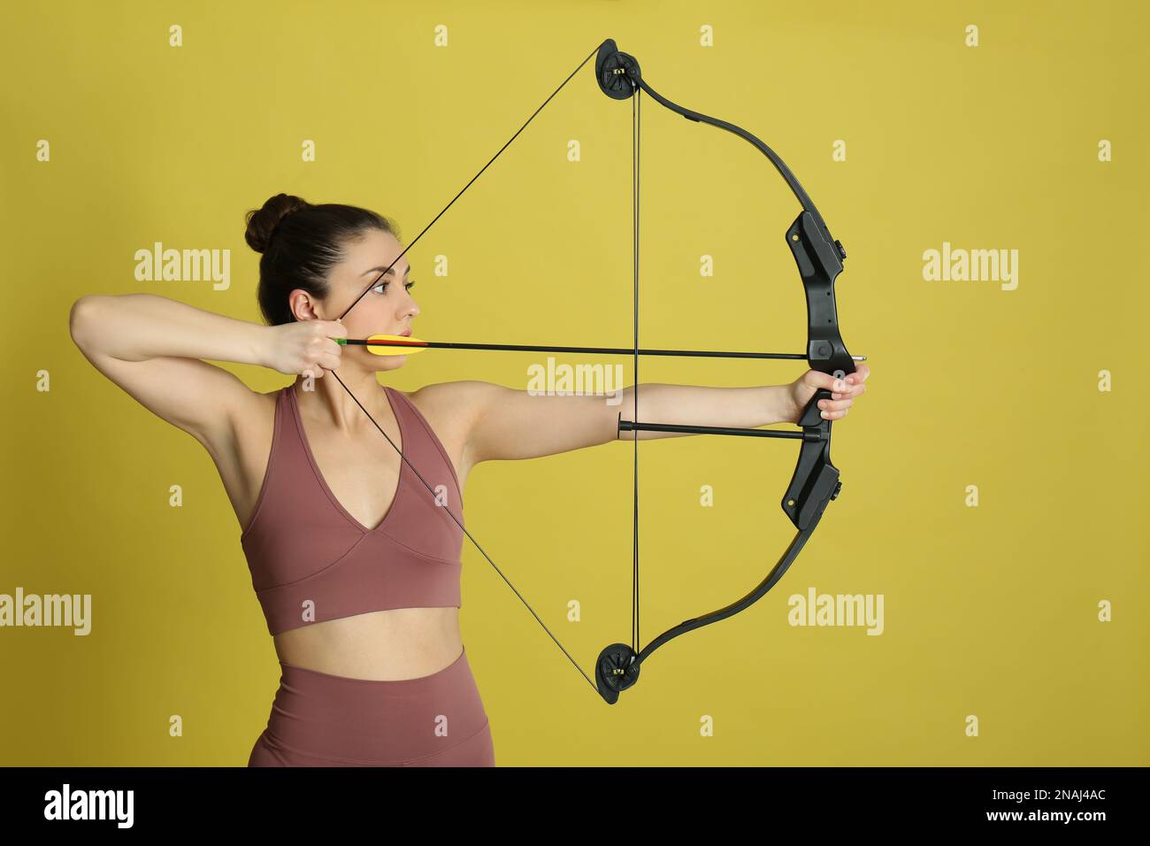 Posing with bow and arrow hi-res stock photography and images - Alamy