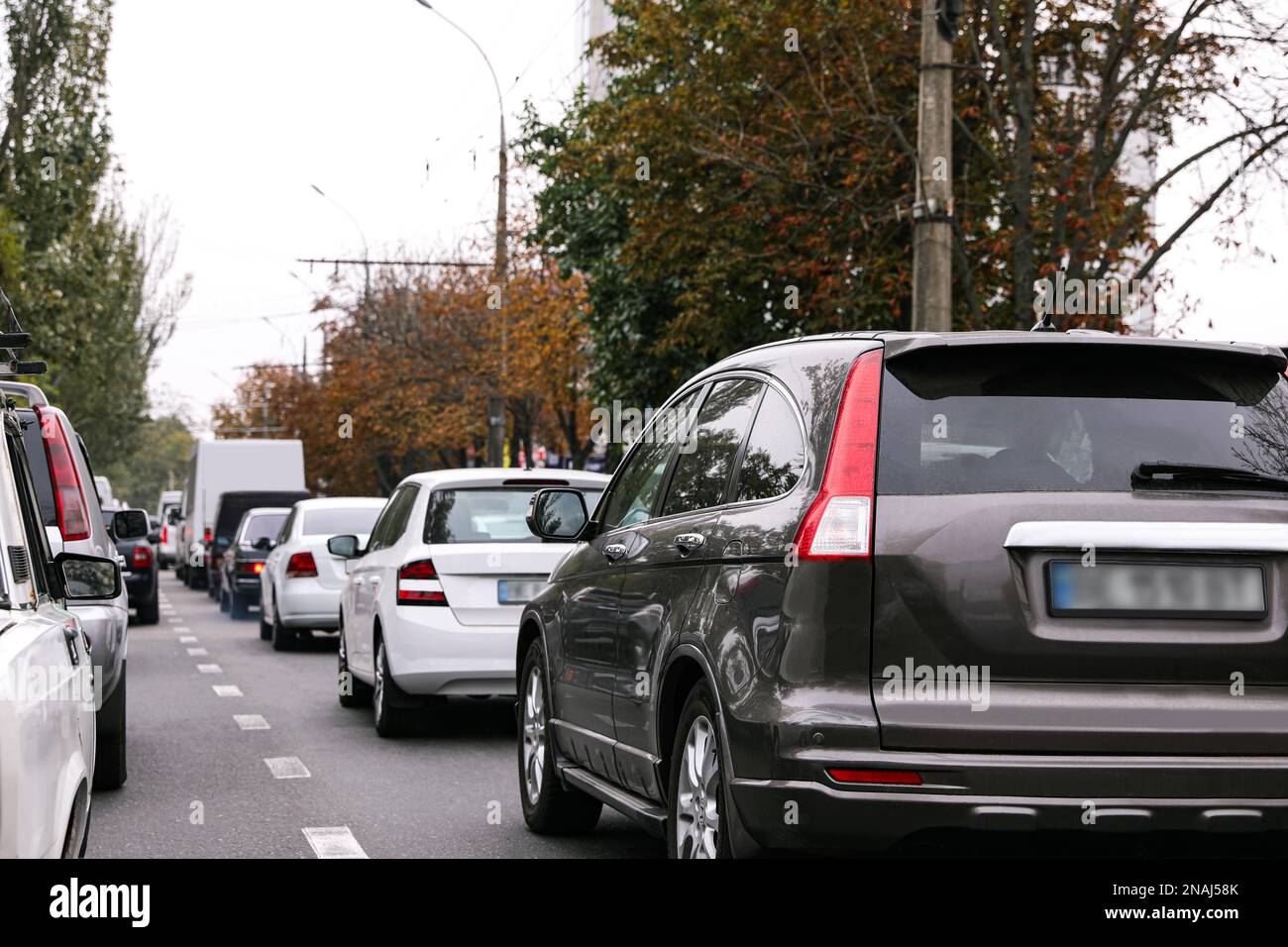 Heavy traffic jam on city street at rush hour Stock Photo - Alamy