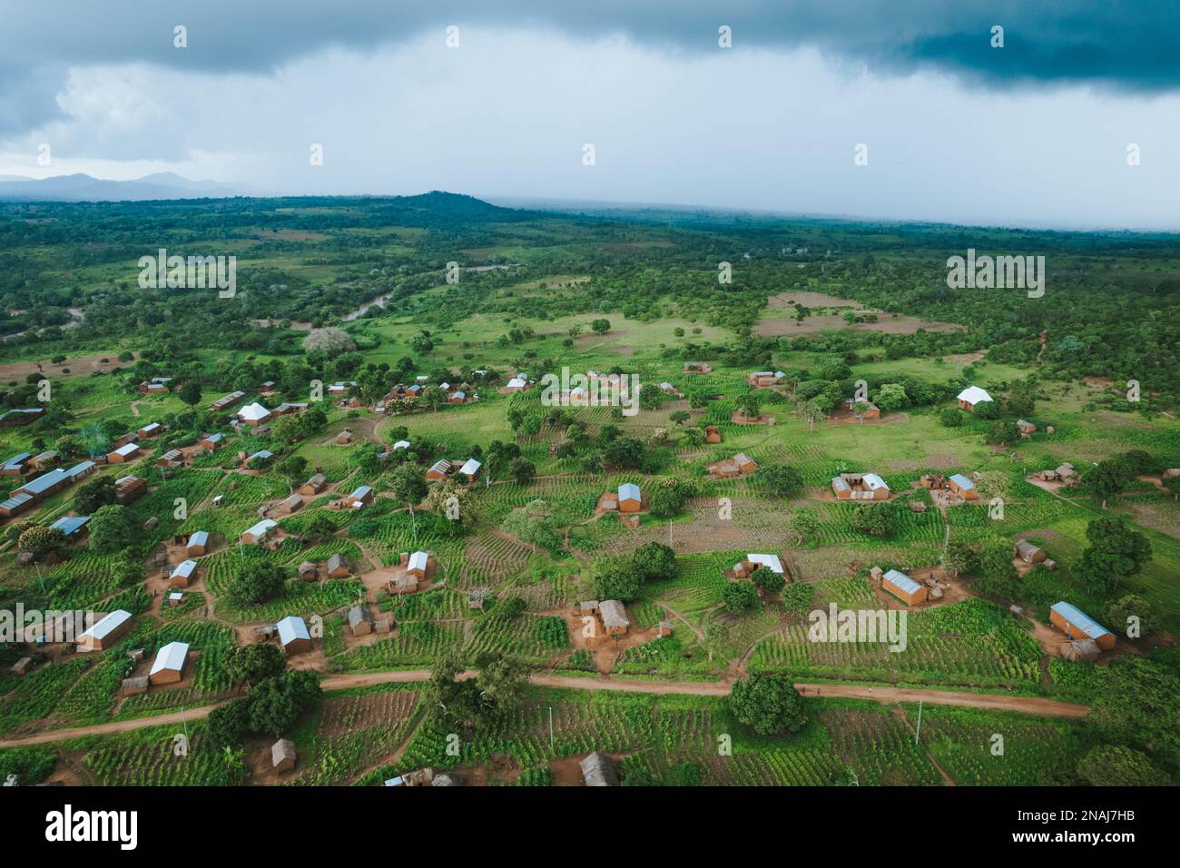 06.02.2023 - Tunduma, Tanzania - Mud brick houses with thatch roofing ...