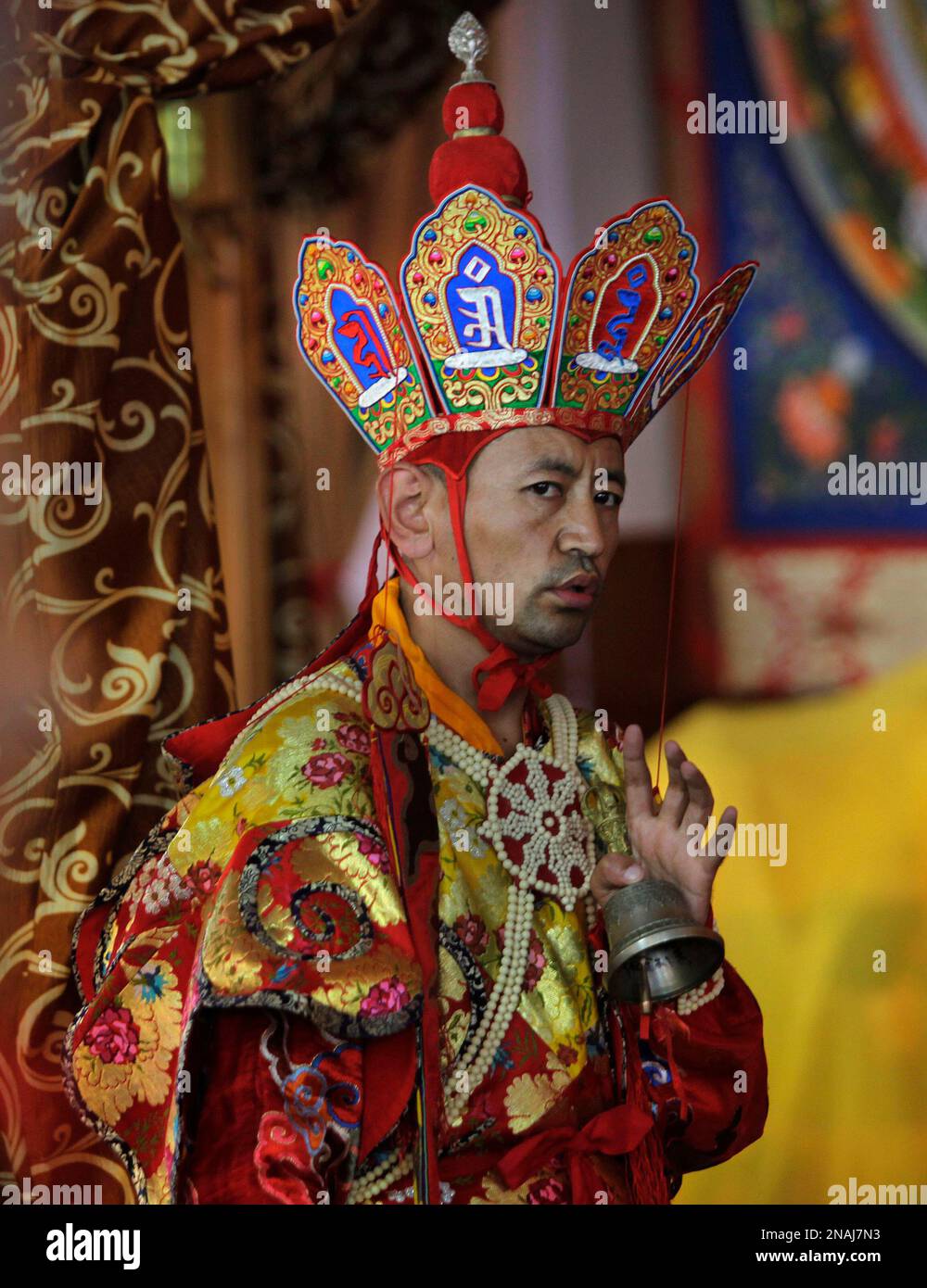 A Buddhist monk performs in presence of Tibetan spiritual leader the ...