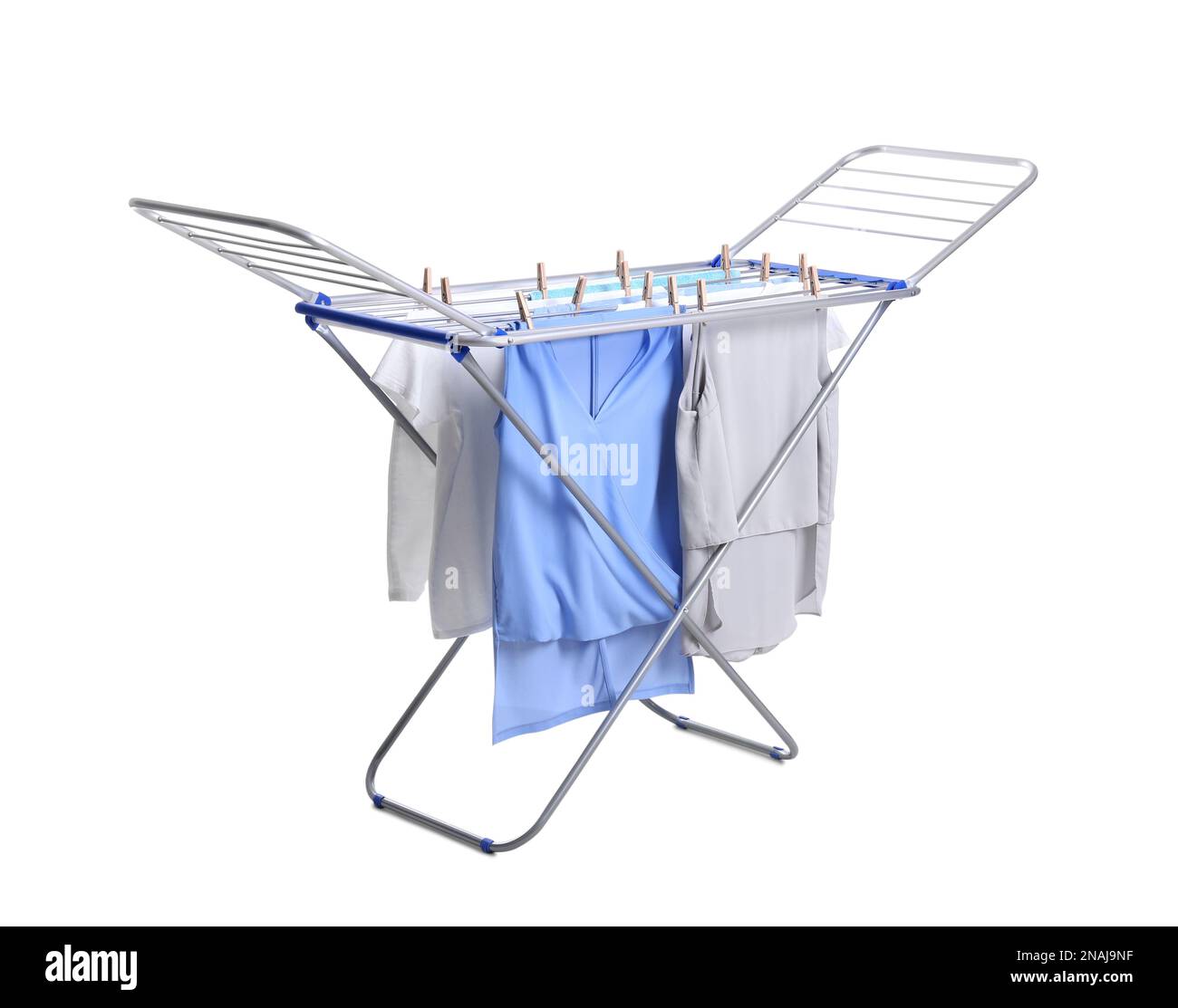 Clean laundry hanging on drying rack against white background Stock ...