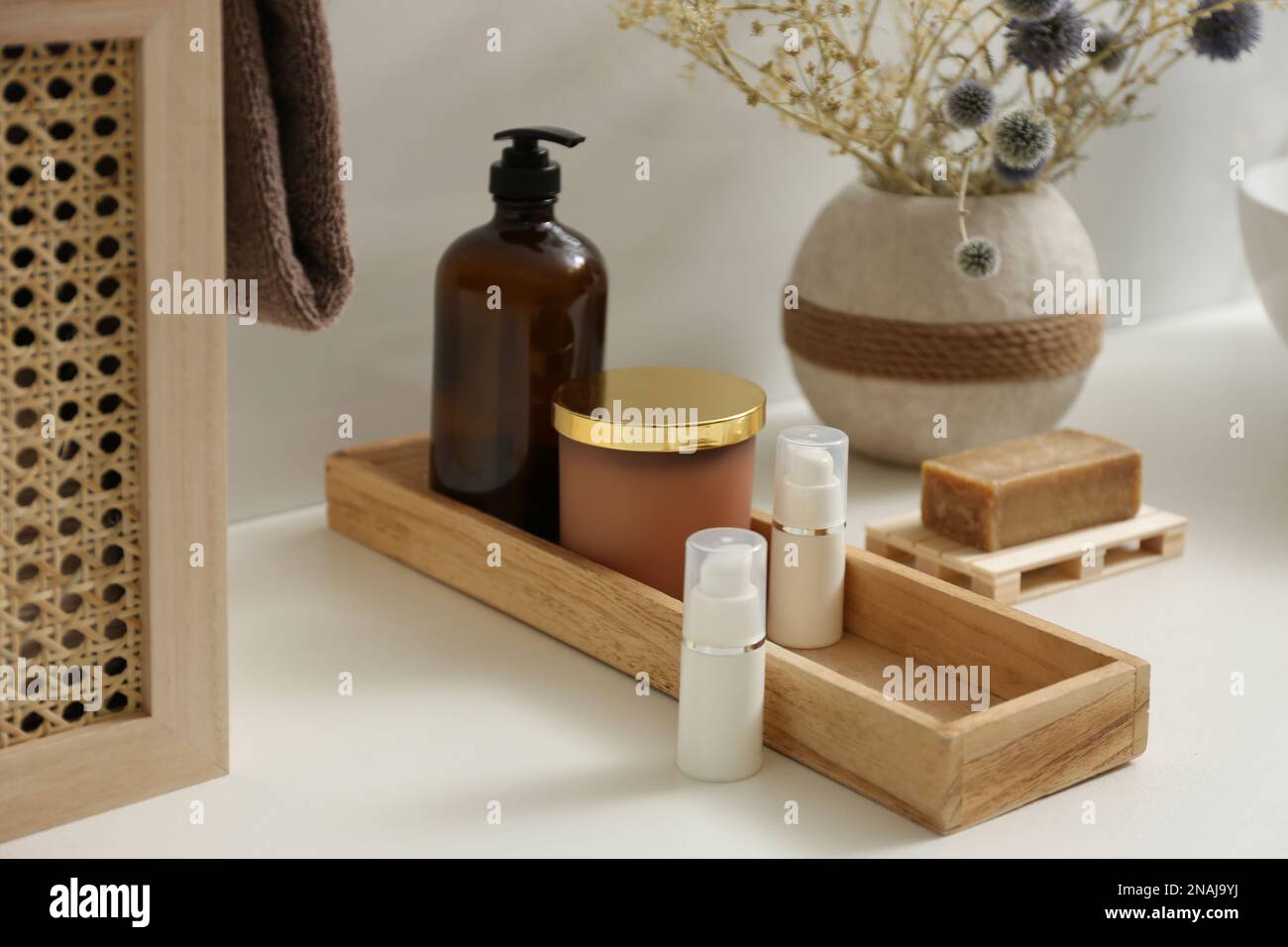 Personal hygiene products and toiletries on table in bathroom Stock ...