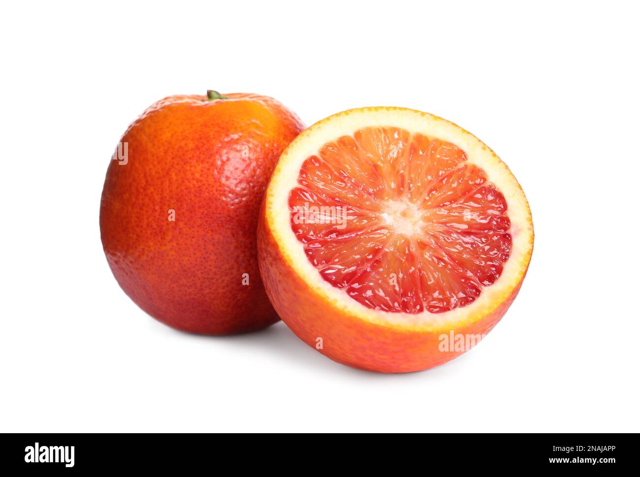 Whole and cut red oranges on white background Stock Photo - Alamy