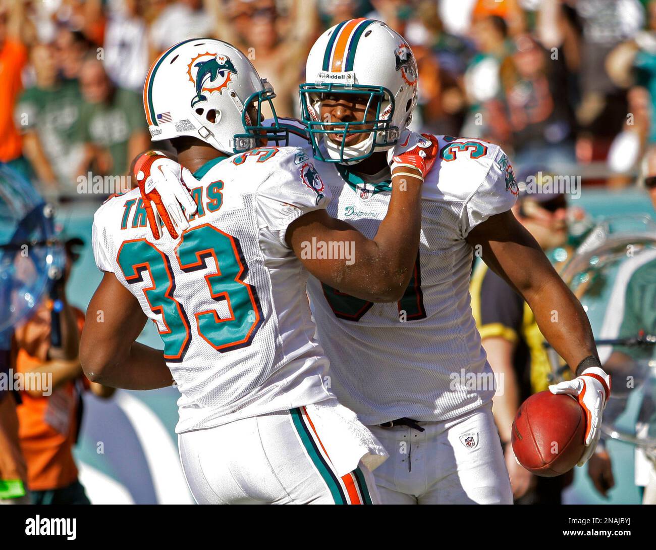 Miami Dolphins running back Daniel Thomas (33) congratulates Dolphins ...