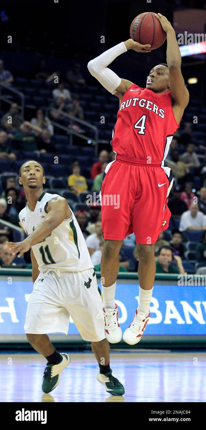 Rutgers guard Myles Mack (4) shoots over South Florida guard Anthony ...