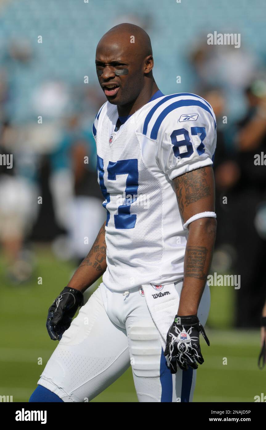 Indianapolis Colts wide receiver Reggie Wayne (87) stretches prior to ...