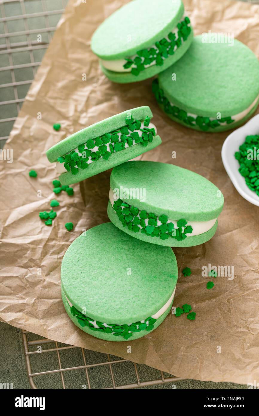Green sandwich cookies with salted caramel and shamrock sprinkles ...