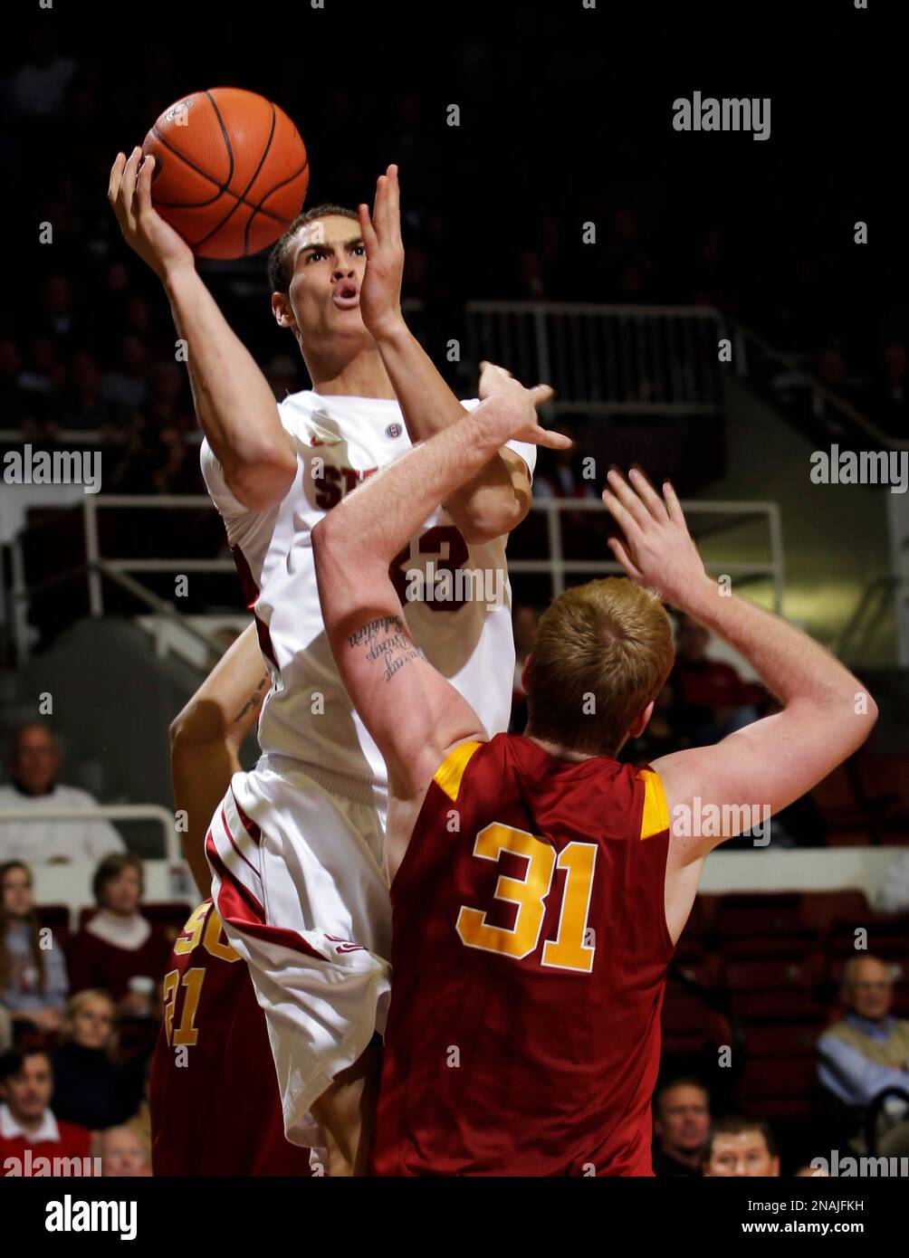 Stanford forward Dwight Powell (33) scores over Southern California ...
