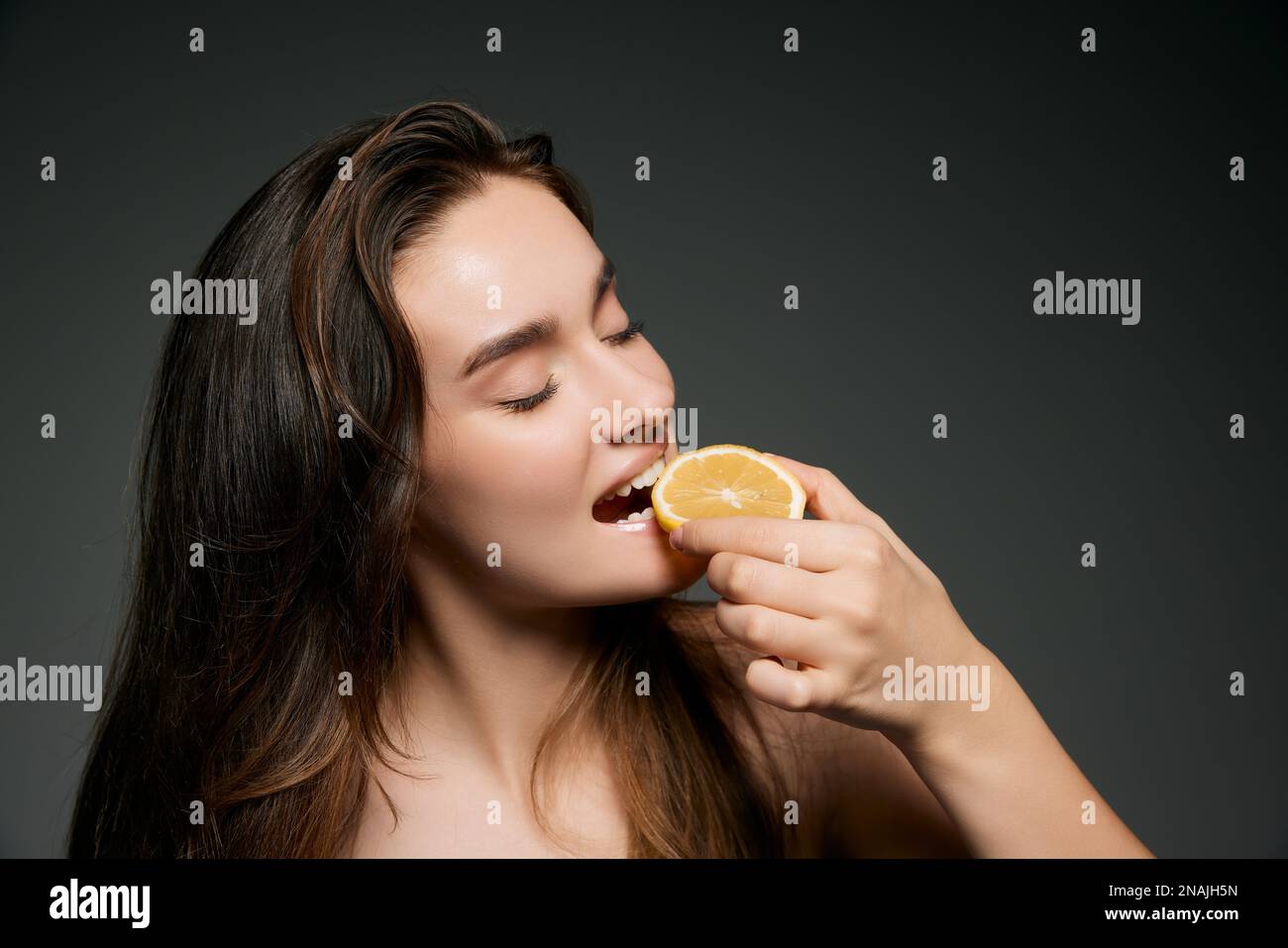 Natural component for face and hair masks. Beautiful young brunette ...