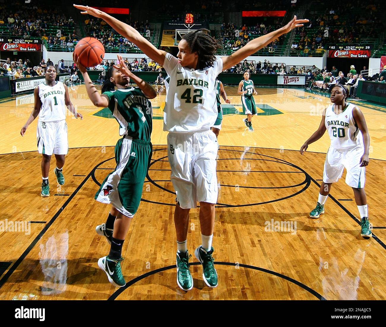 Baylor's Brittney Griner, center, reaches over Mississippi Valley State ...