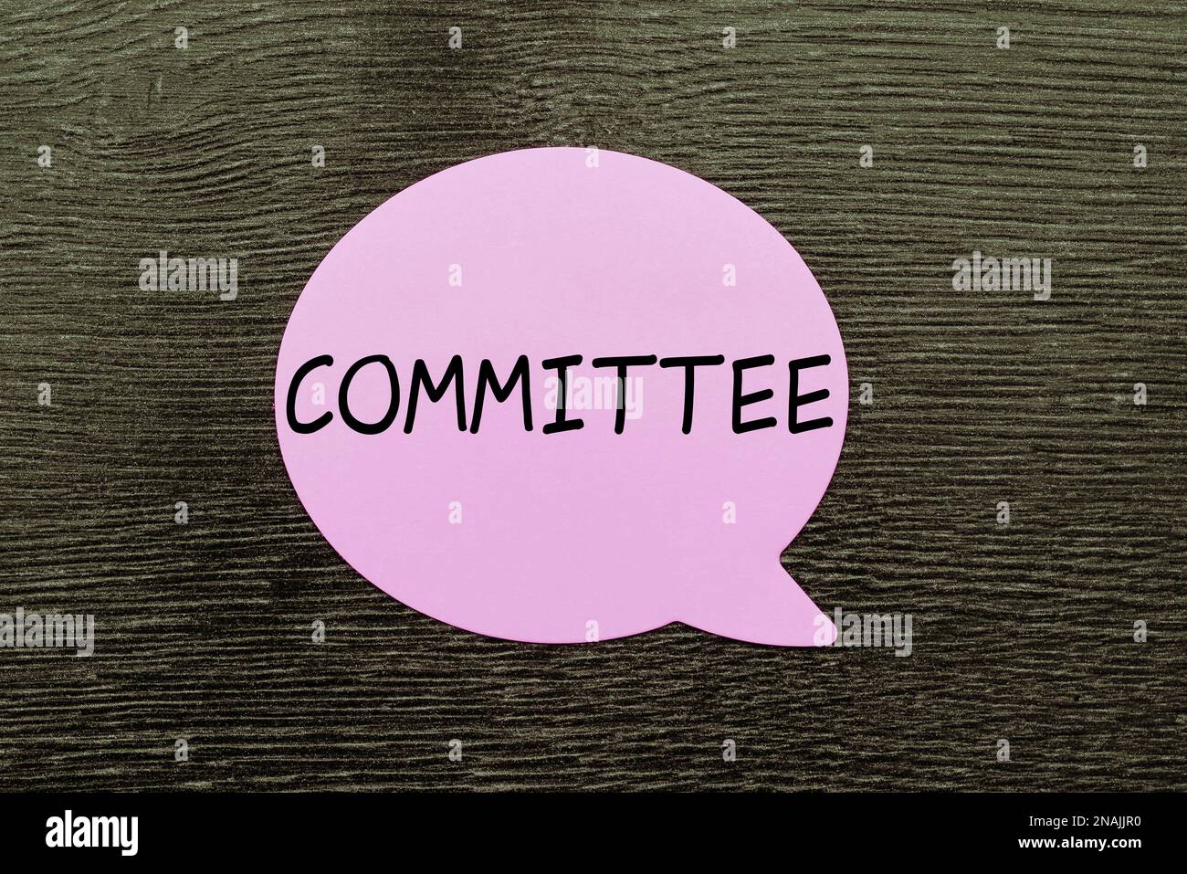 Sign displaying Committee. Business overview Group of people appointed ...