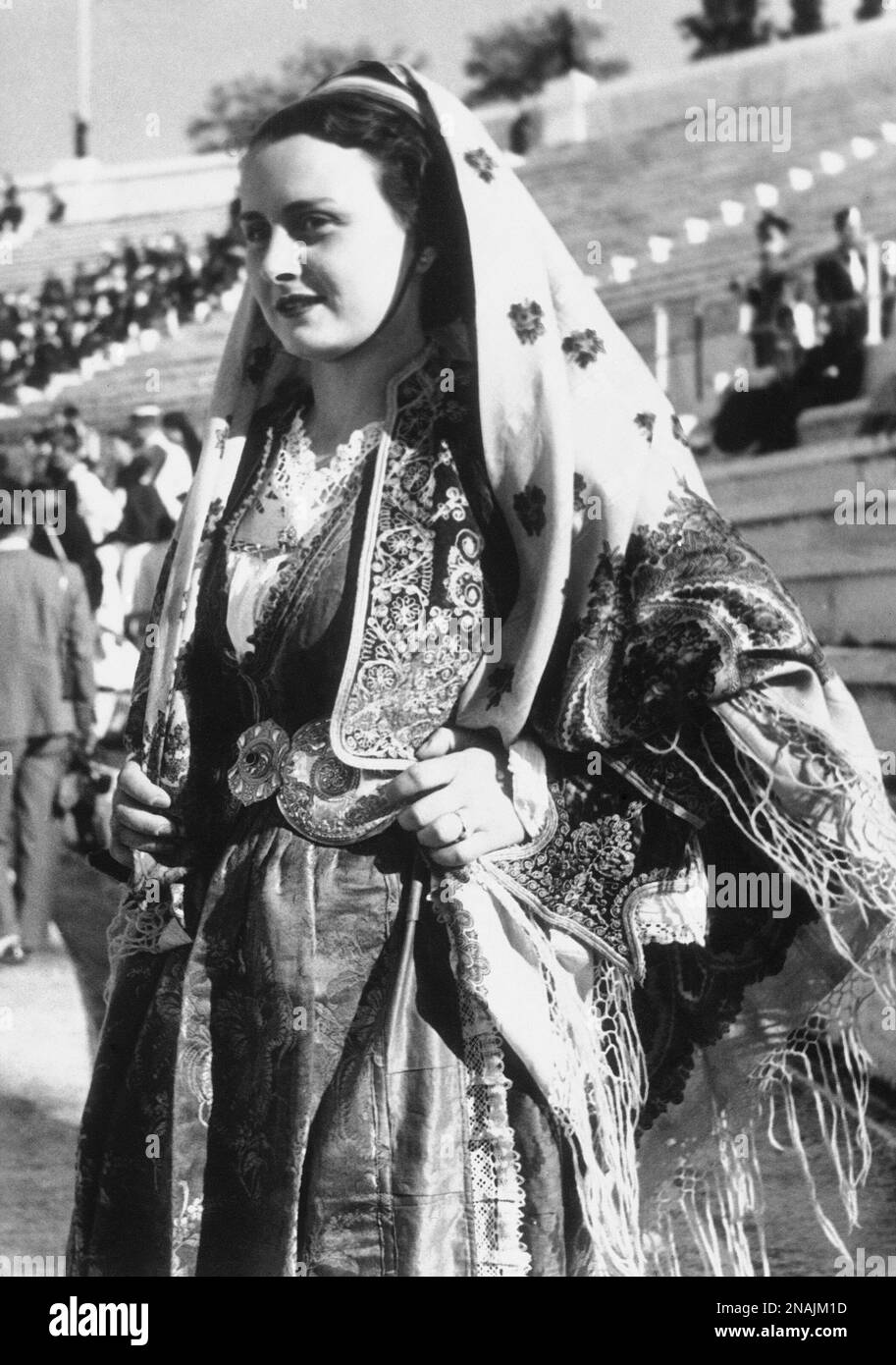 A Greek peasant girl in the traditional costume of the island of ...