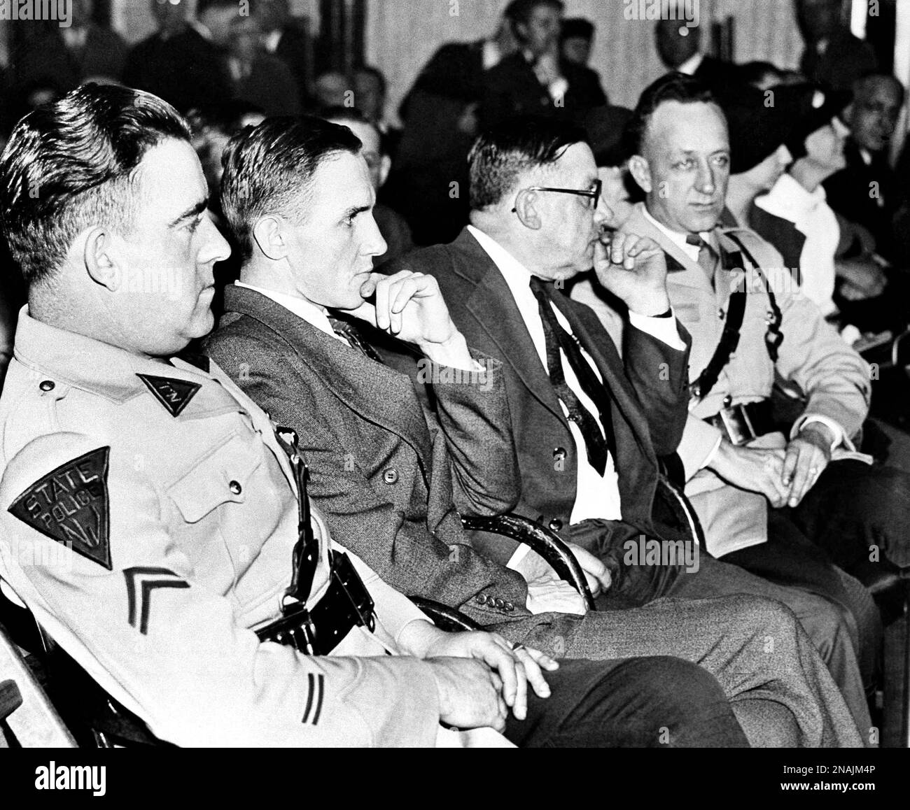 Chin resting on hand, Bruno Richard Hauptmann wore this serious air as ...