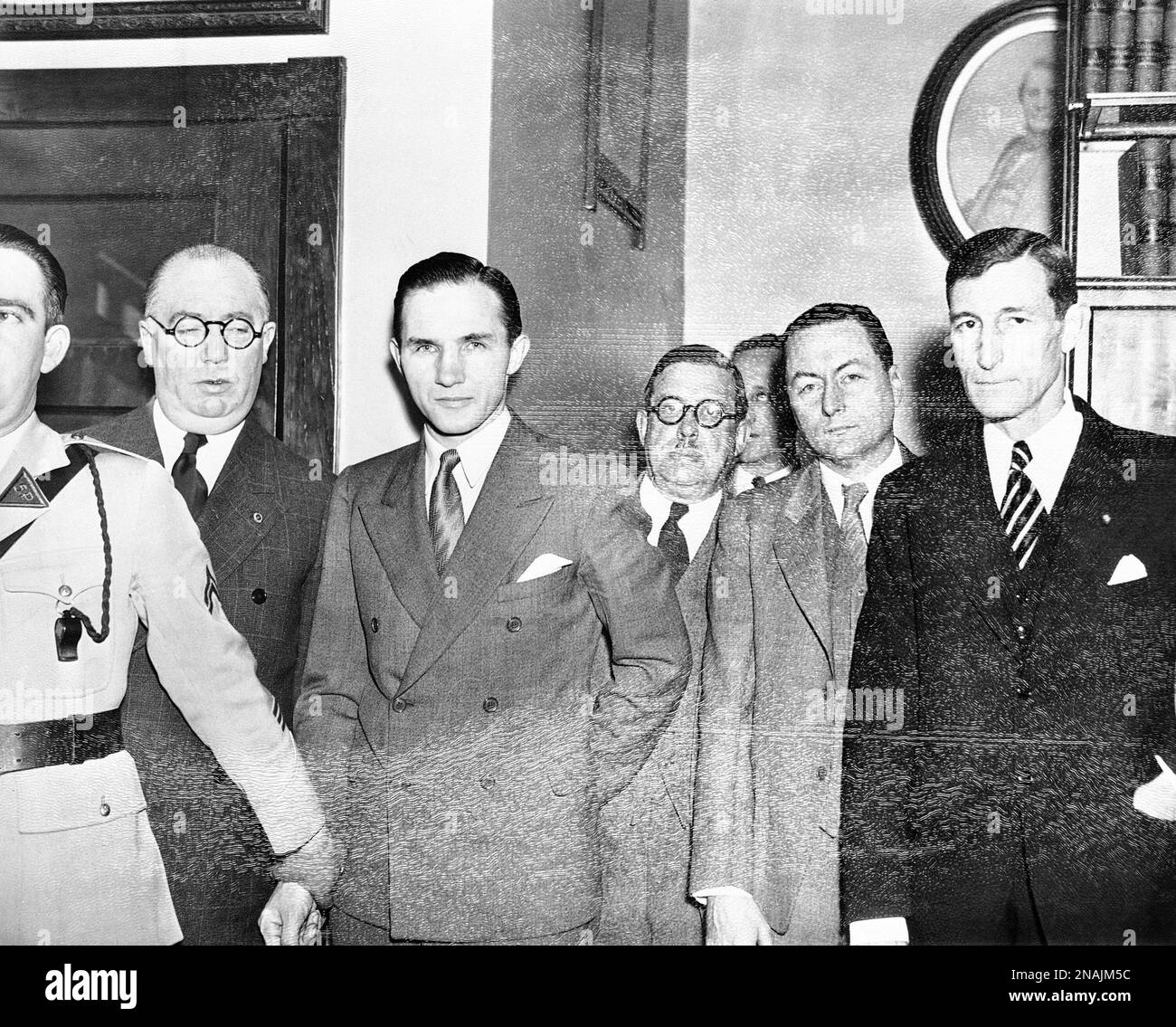 Edward J. Reilly, chief defense counsel, left, enters court at ...