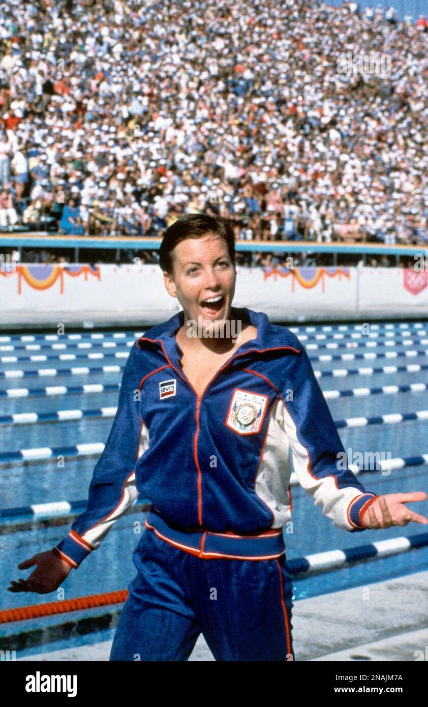 America's Mary Wayte smiles as she is walks by the pool to receive her ...