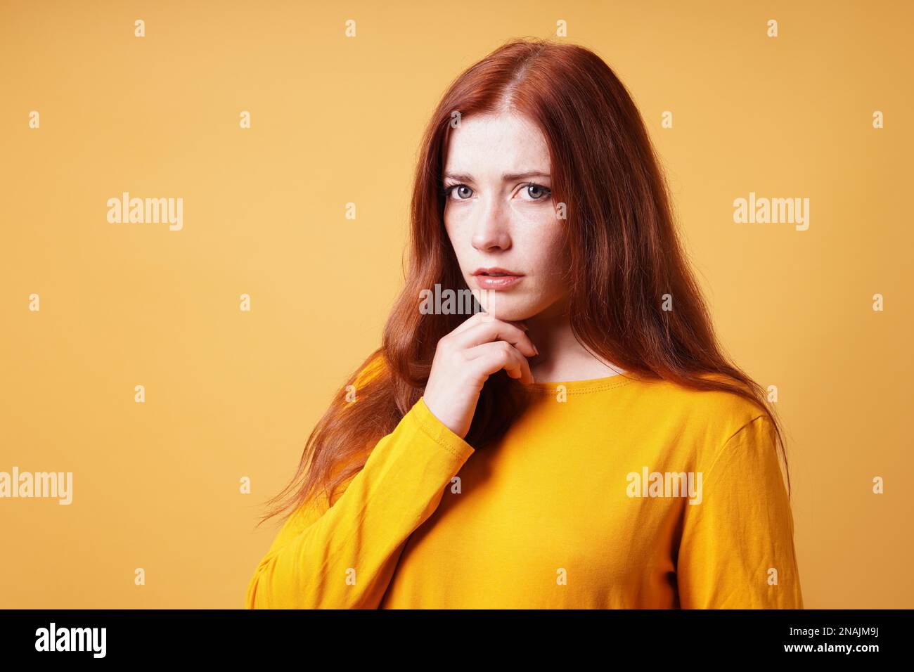 worried concerned young woman thinking about her anxiety for the future ...