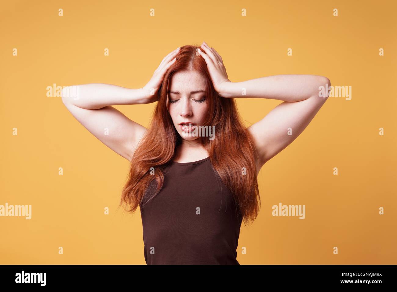 stressed exhausted young woman suffering from headache or nervous ...