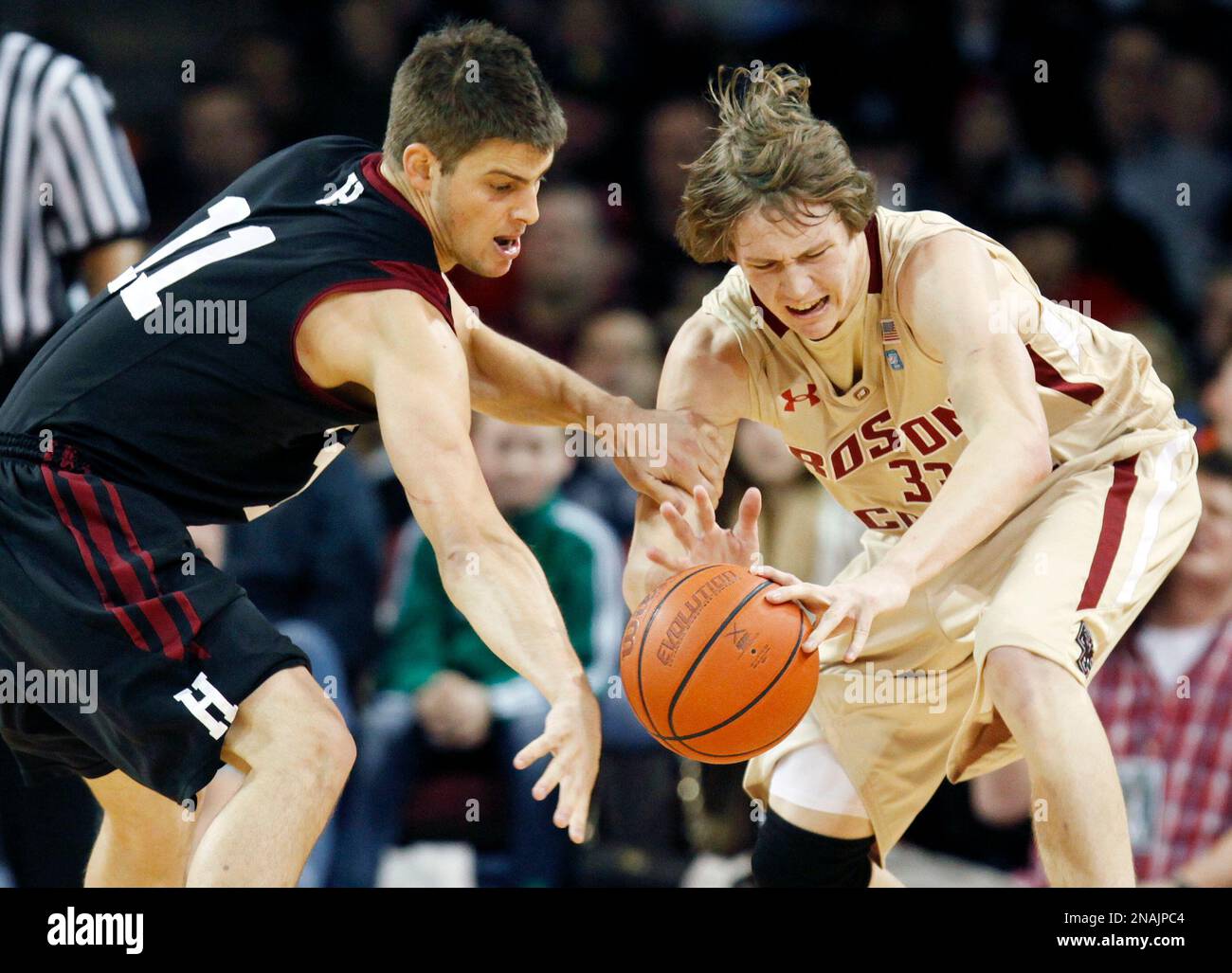 Harvard's Oliver McNally (11) and Boston College's Patrick Heckmann (33 ...