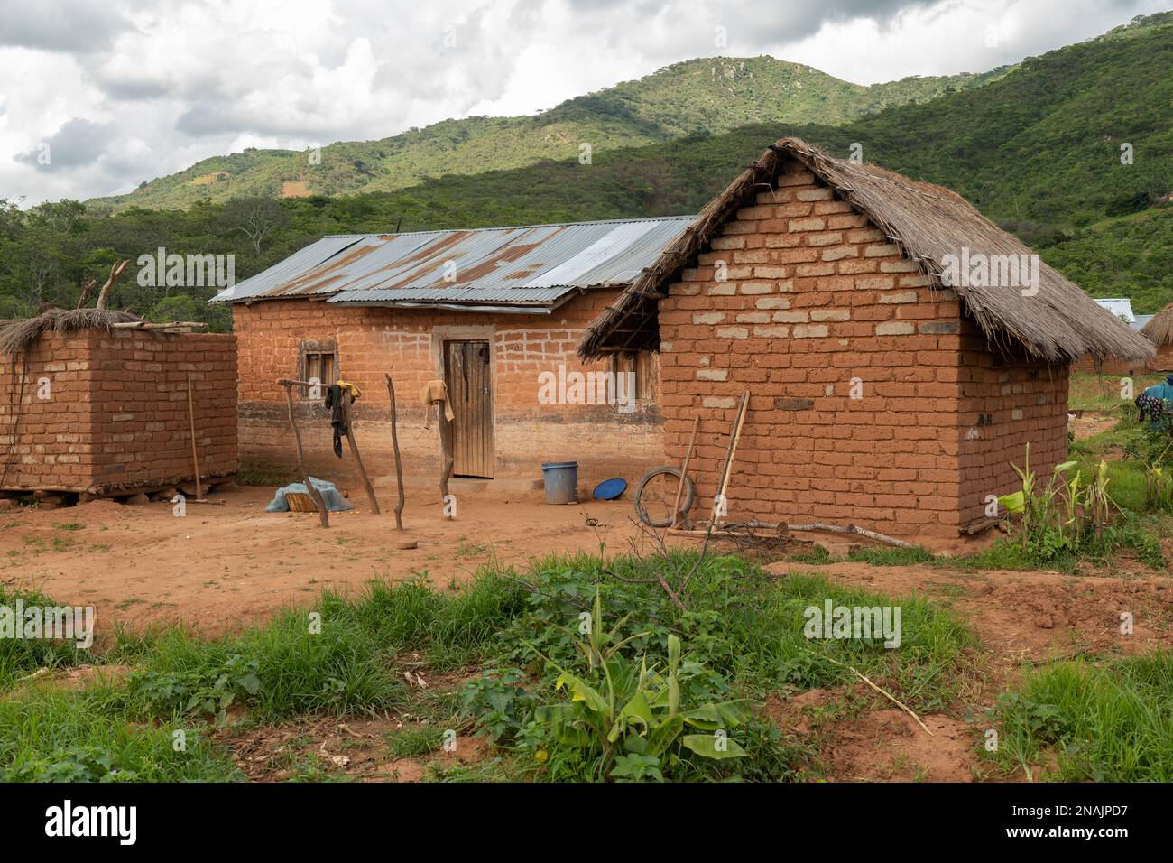 06.02.2023 - Tunduma, Tanzania - Mud brick houses with thatch roofing ...