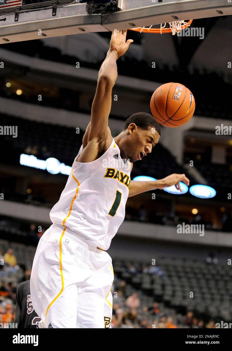 Baylor forward Perry Jones III finishes off a dunk during an NCAA ...