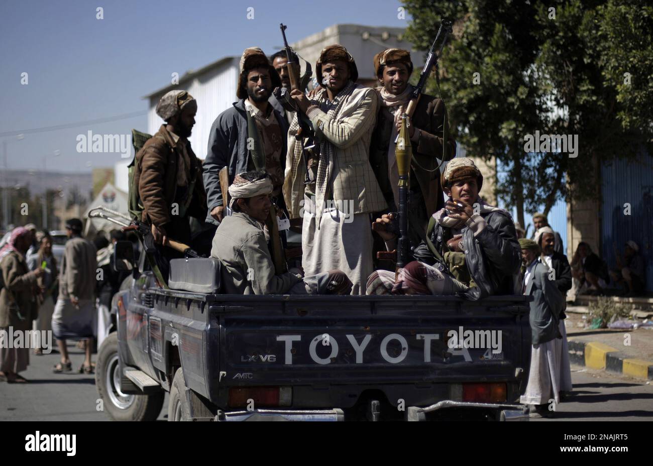 Armed Yemeni tribesmen loyal to Sheik Sadeq al-Ahmar, the head of the ...