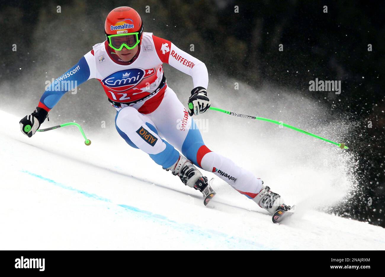 Switzerland's Patrick Kueng takes a curve during a men's World Cup ...