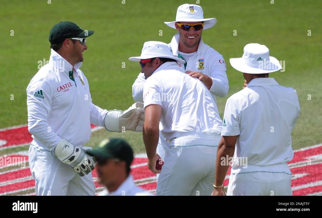 Mark Boucher, left, of South Africa congratulates teammate Jaques ...