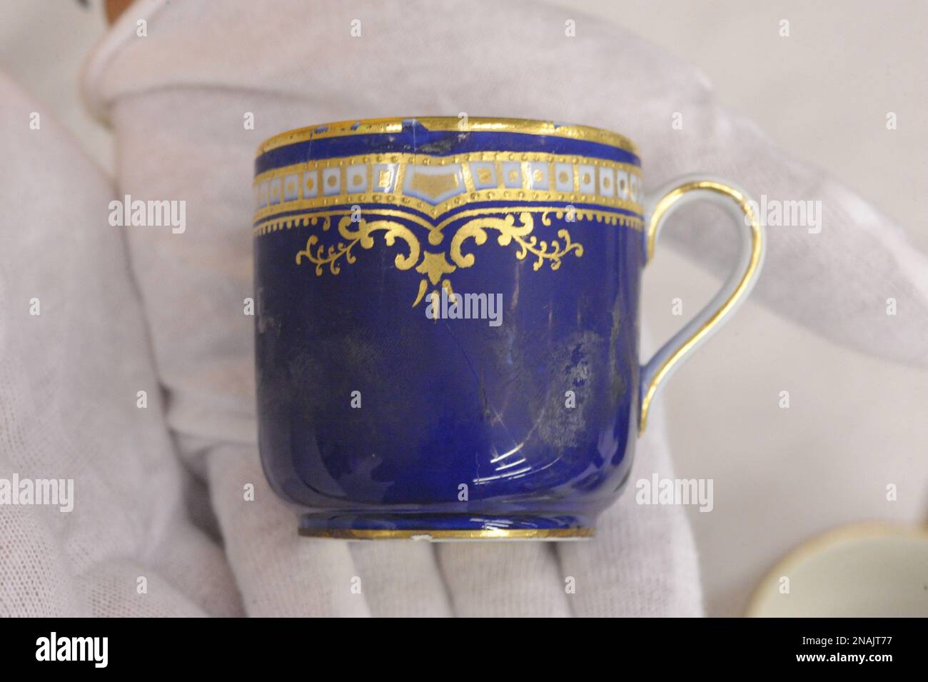 FILE - First class tea cup china used by passengers is a part of the ...