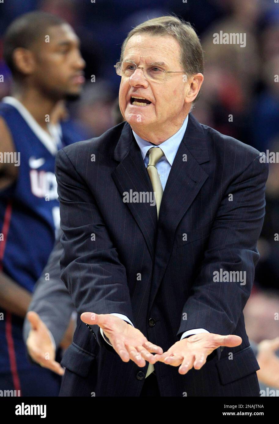 Connecticut associate head coach George Blaney pleads with an official ...