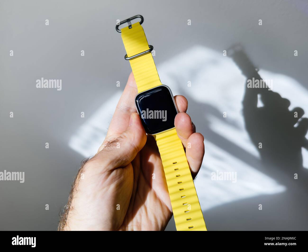 Paris, France - Sep 23, 2022: Happy customer holding new Apple Watch ...