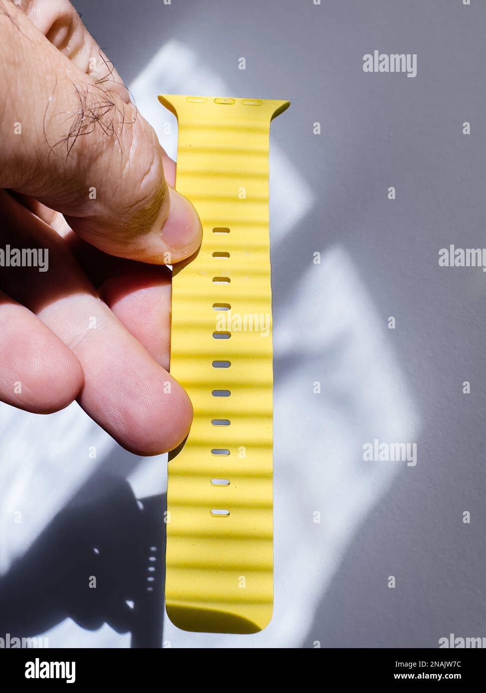 Paris, France - Sep 23, 2022: Happy customer holding new titanium Apple ...