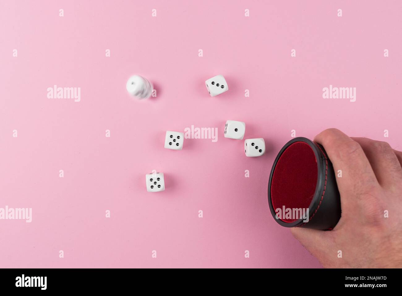 Hand rolling die dice hi-res stock photography and images - Alamy
