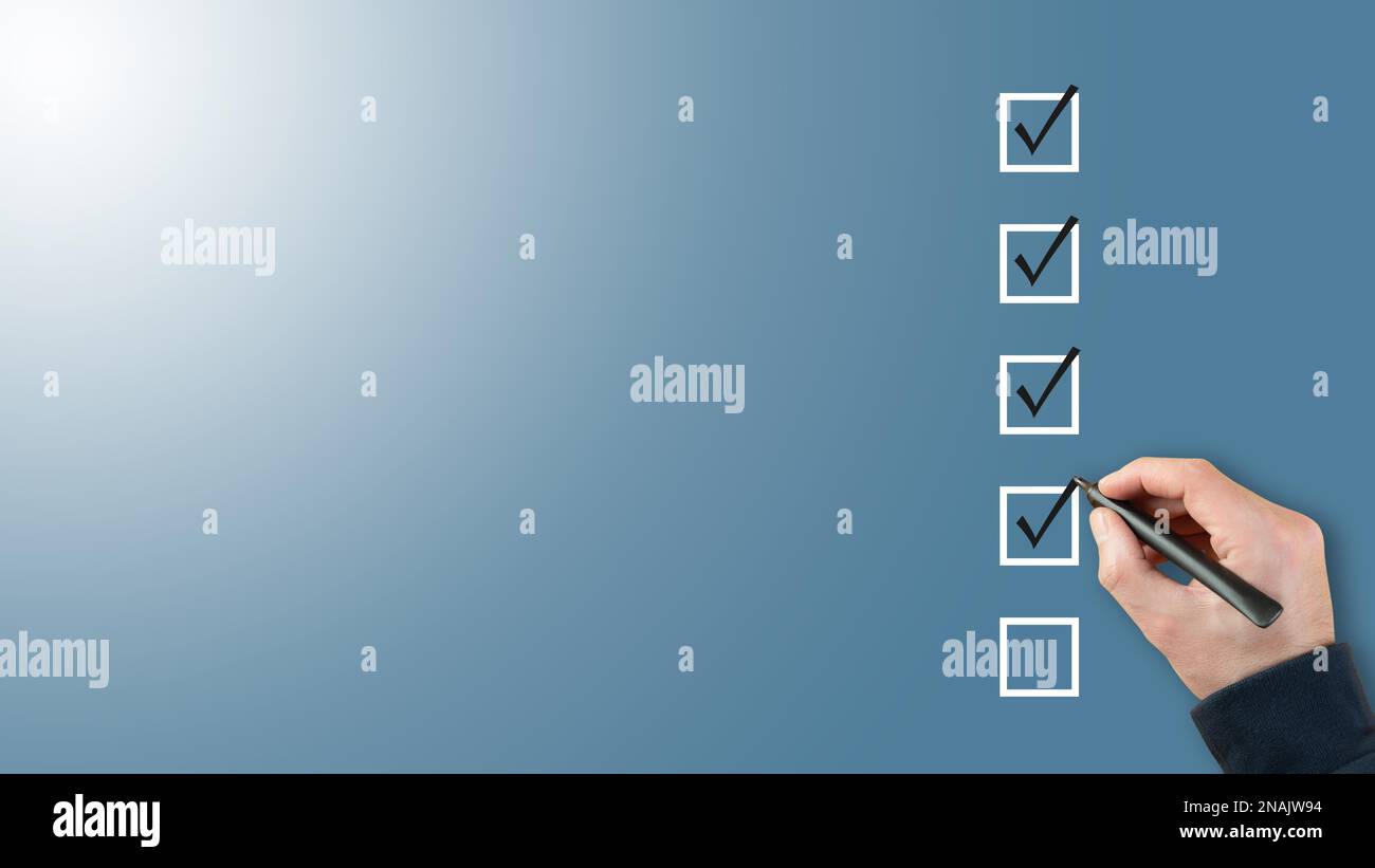 person ticking checkboxes with marker pen on checklist or to-do-list ...