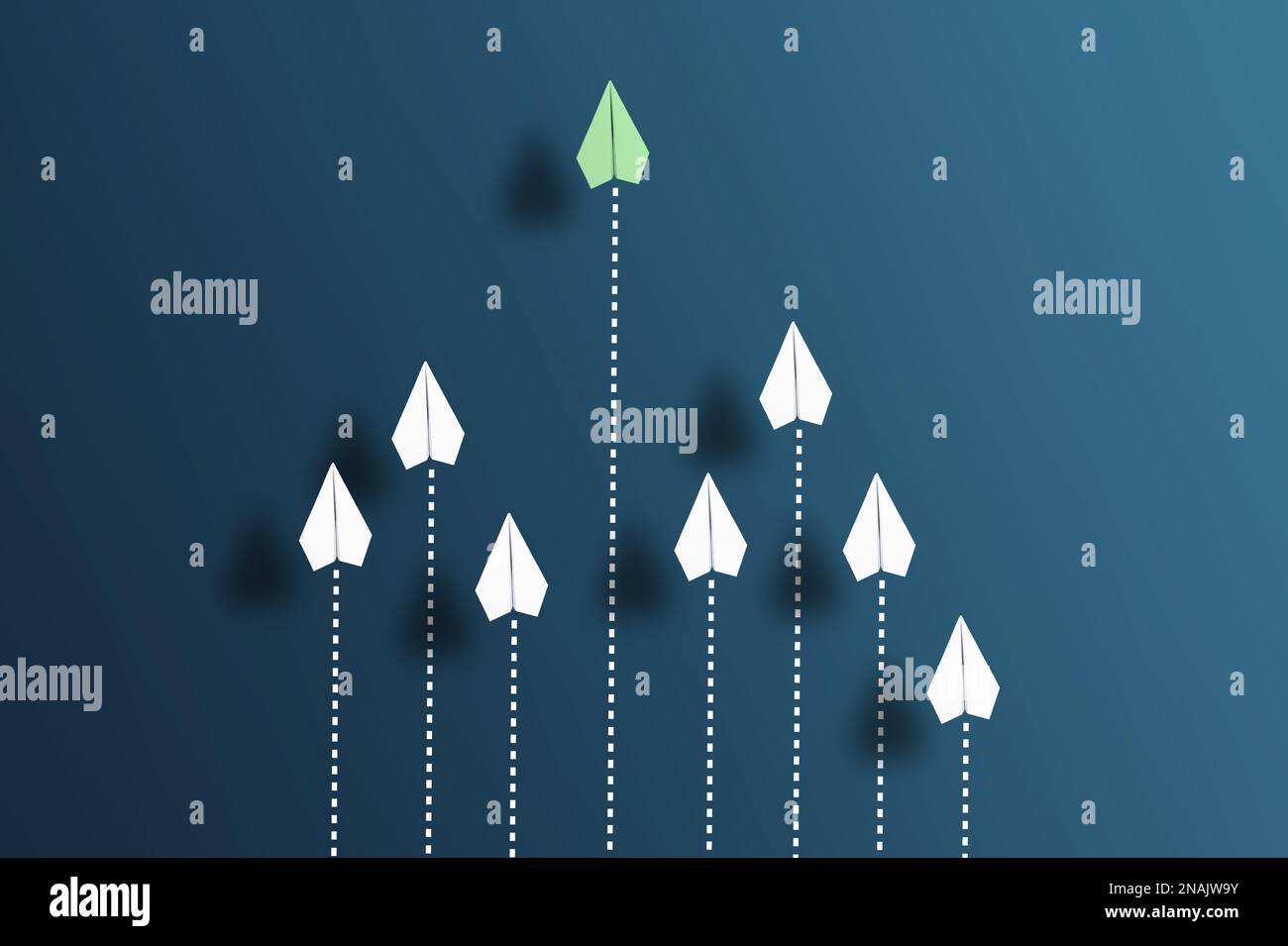 paper planes flying in formation in one direction on blue background ...