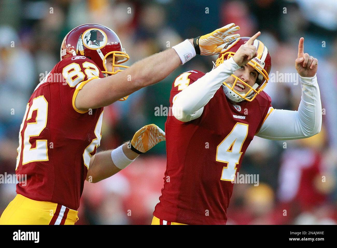 Washington Redskins tight end Logan Paulsen (82) congratulates kicker ...