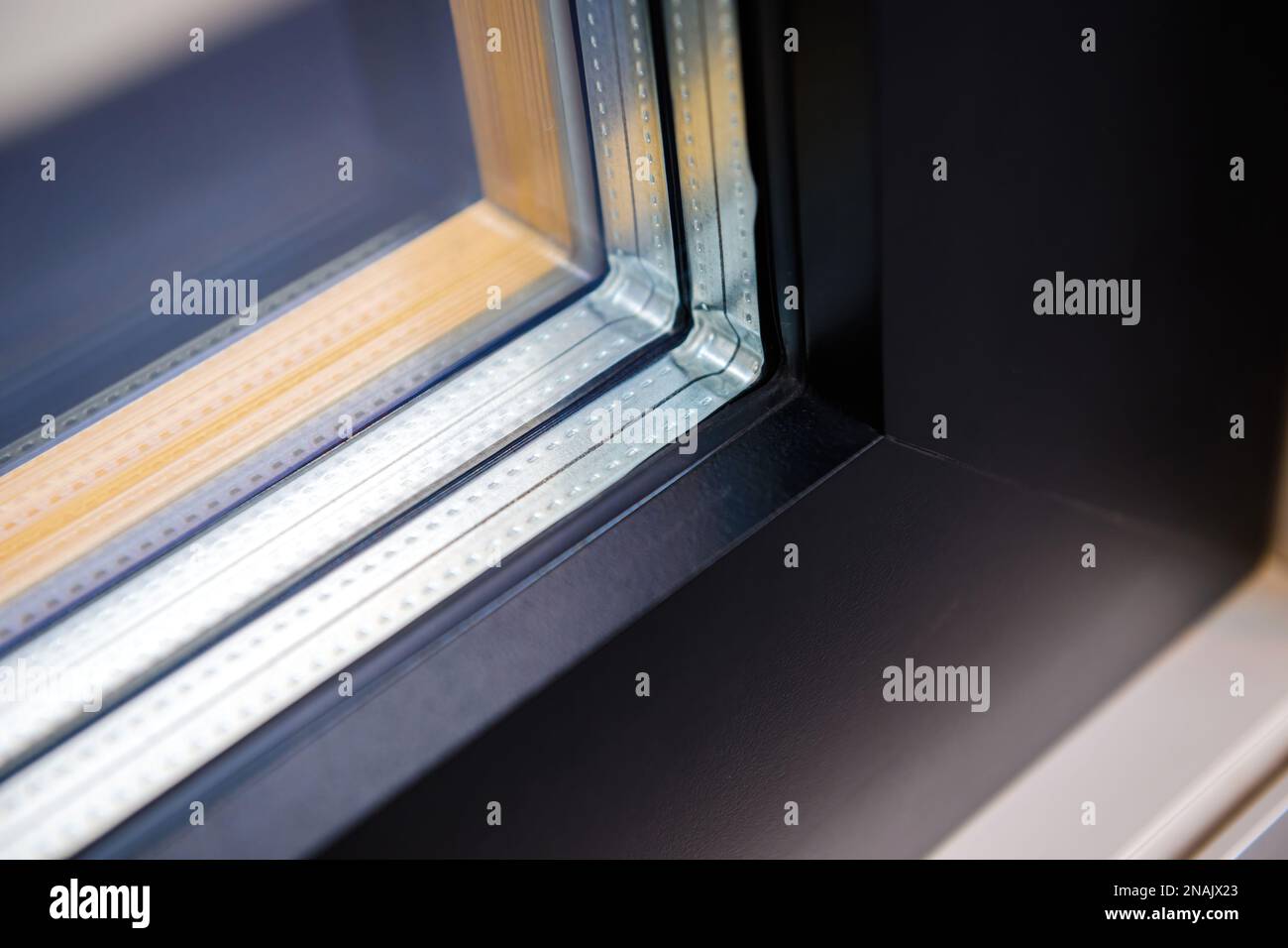 Close-up macro view of window frame made from PVC wooden profiles ...