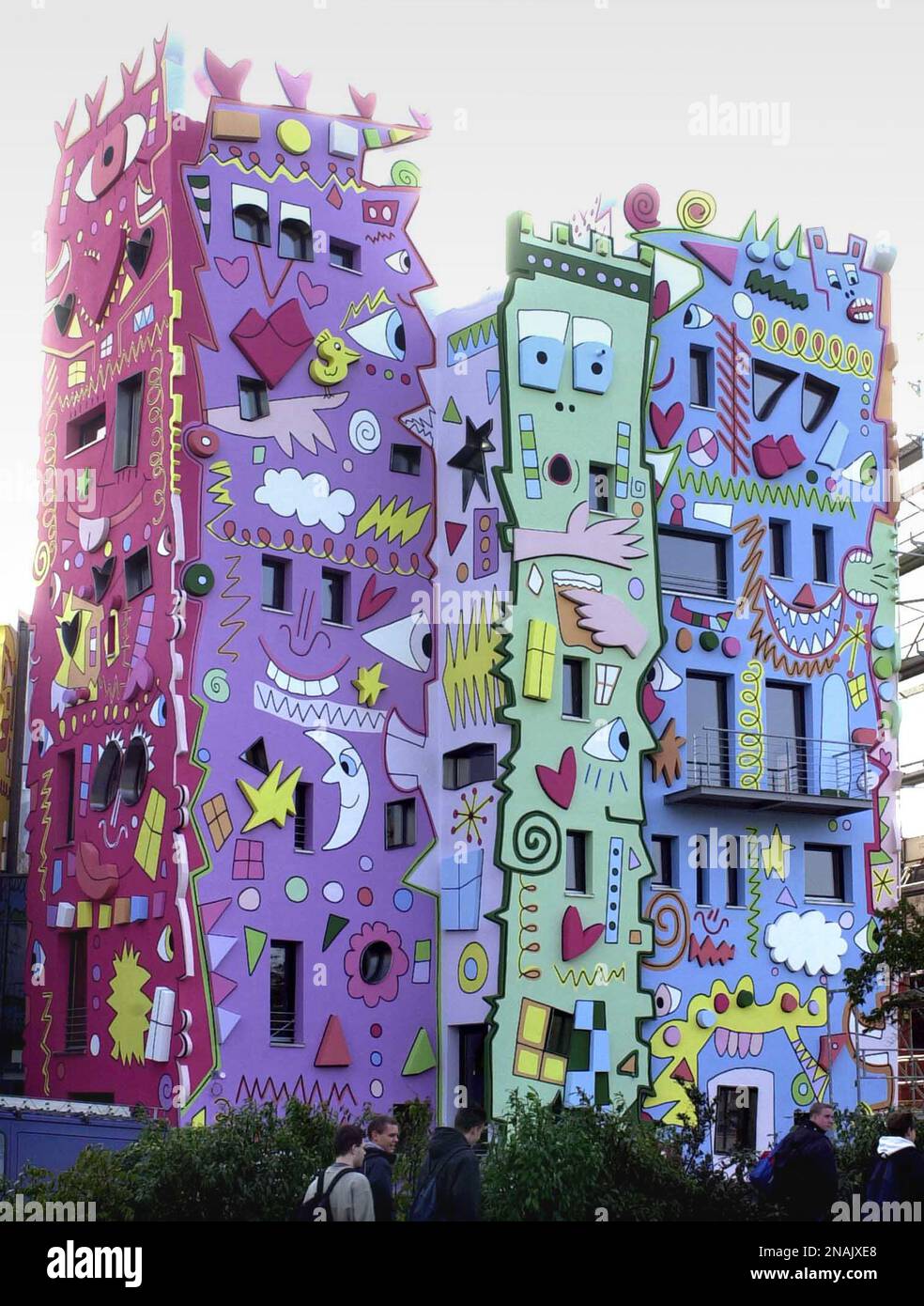 FILE - In this Oct. 30, 2001 file photo, youths walk by the Rizzi-House ...