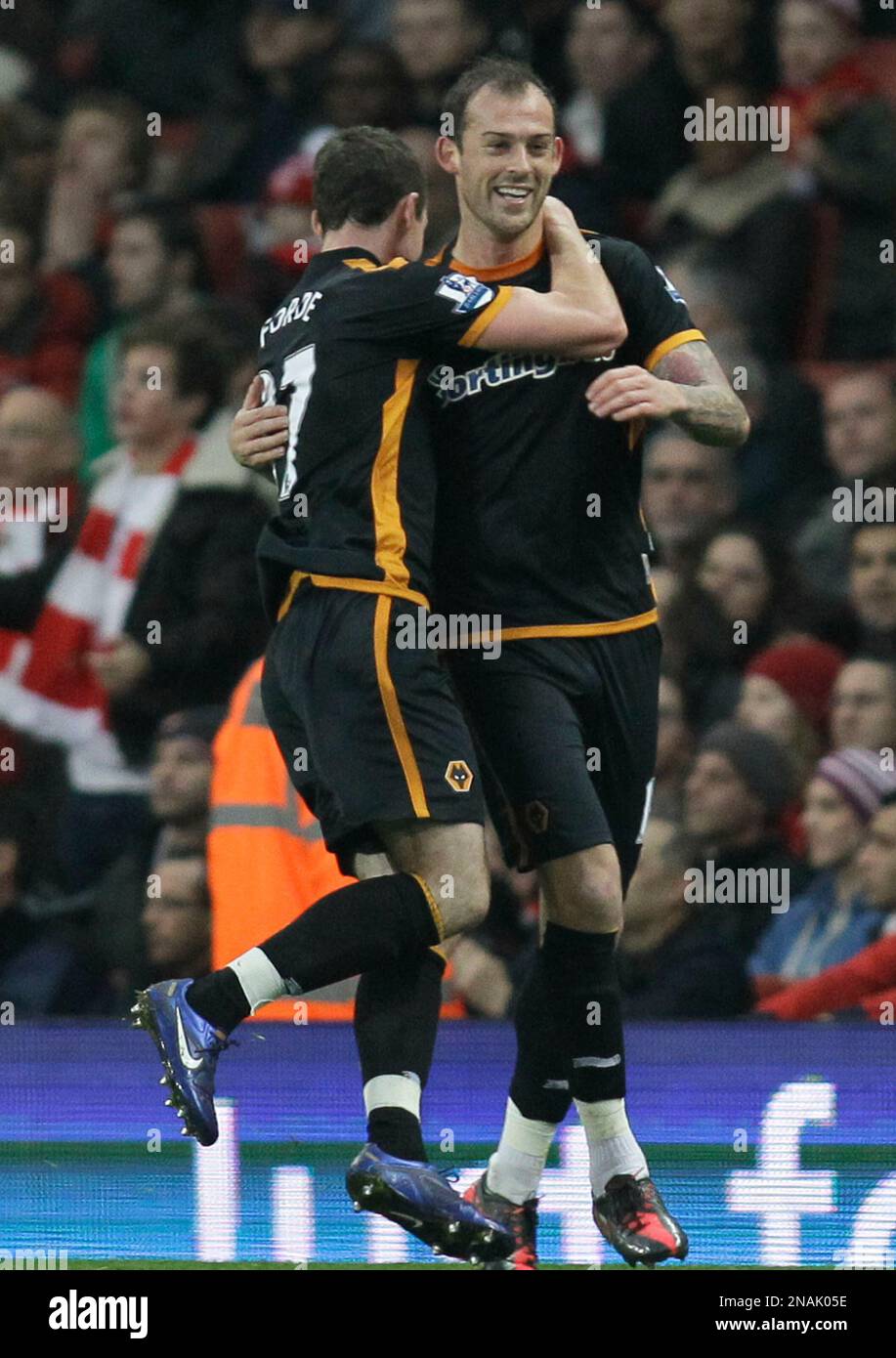 Arsenal's Wolverhampton Wanderers' Steven Fletcher, right, celebrates ...