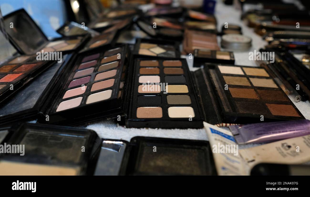 Behind the scenes - multiple colorful makeup sets Stock Photo - Alamy