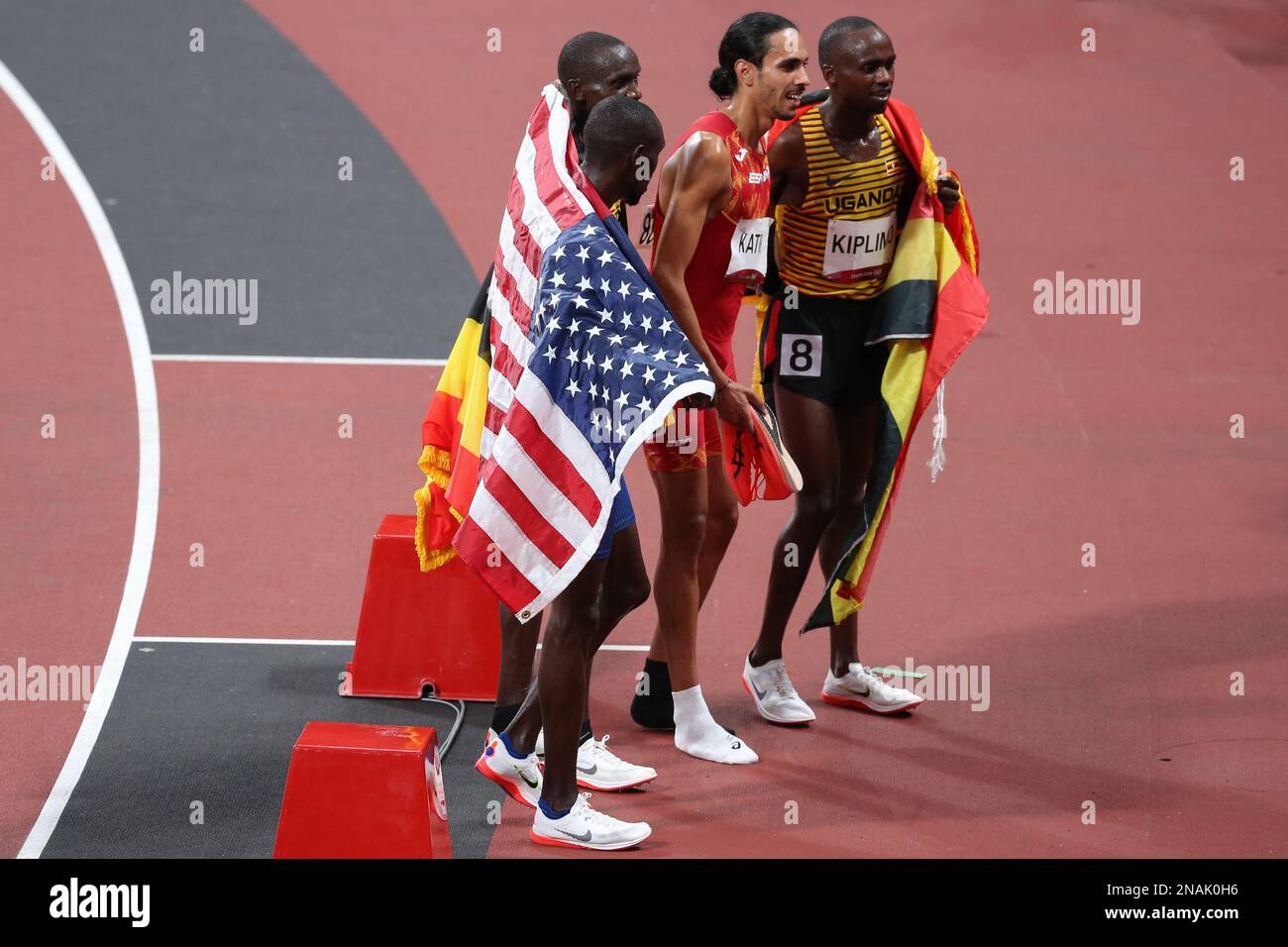 AUG 06, 2021 - Tokyo, Japan: Joshua Cheptegei of Uganda, Mohammed Ahmed ...