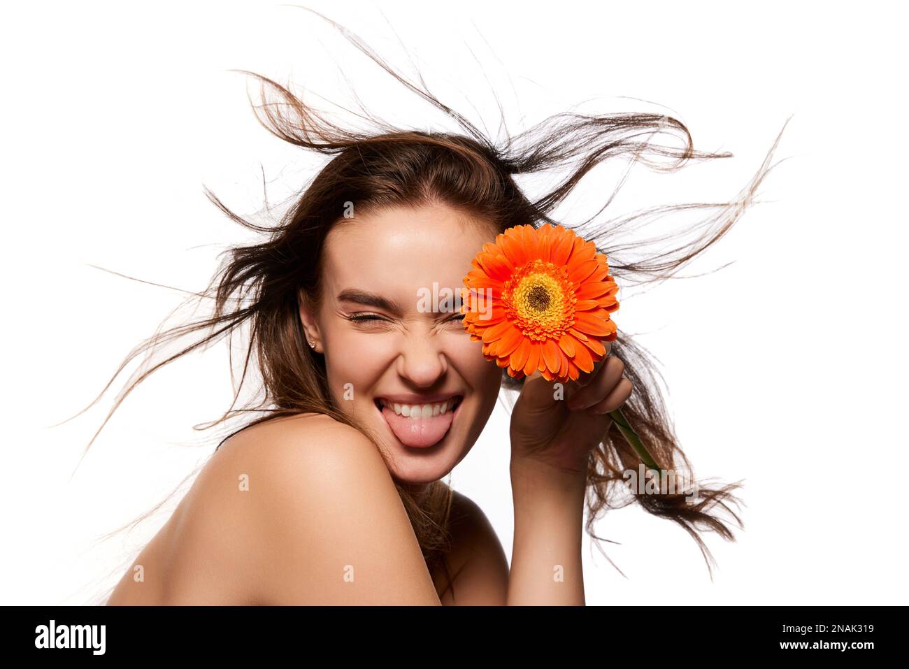 Burst of positive energy. Beautiful young girl with well-kept clean ...