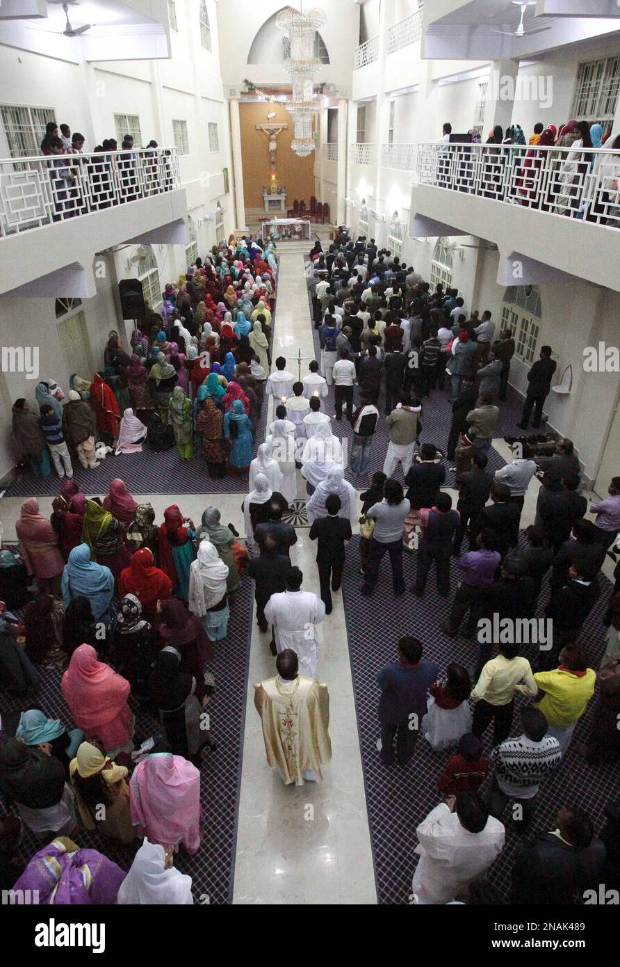 Pakistani Christians attend a Christmas mass at St. Peter Catholic ...