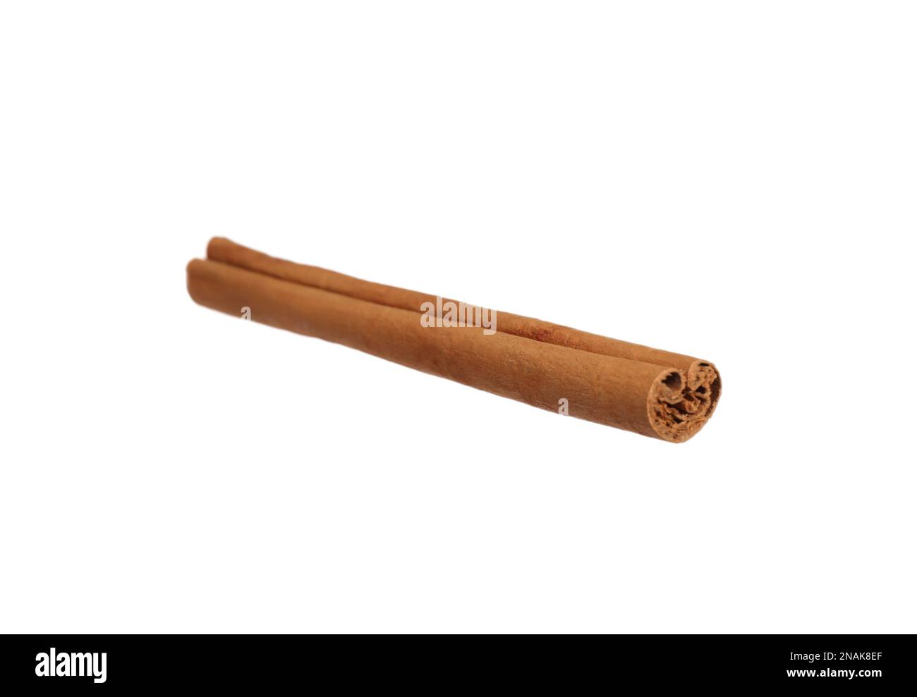 Aromatic dry cinnamon stick isolated on white Stock Photo - Alamy
