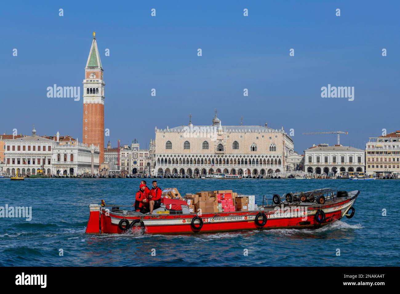 Delivery boat of the parcel service DPD on the Grand Canal in front of ...