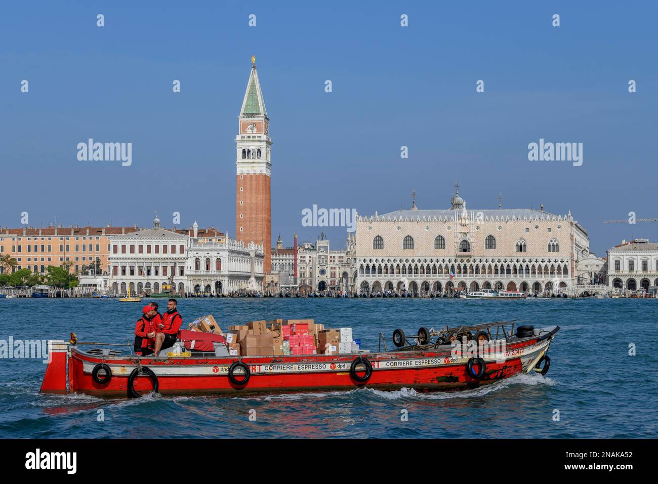 Delivery boat of the parcel service DPD on the Grand Canal in front of ...