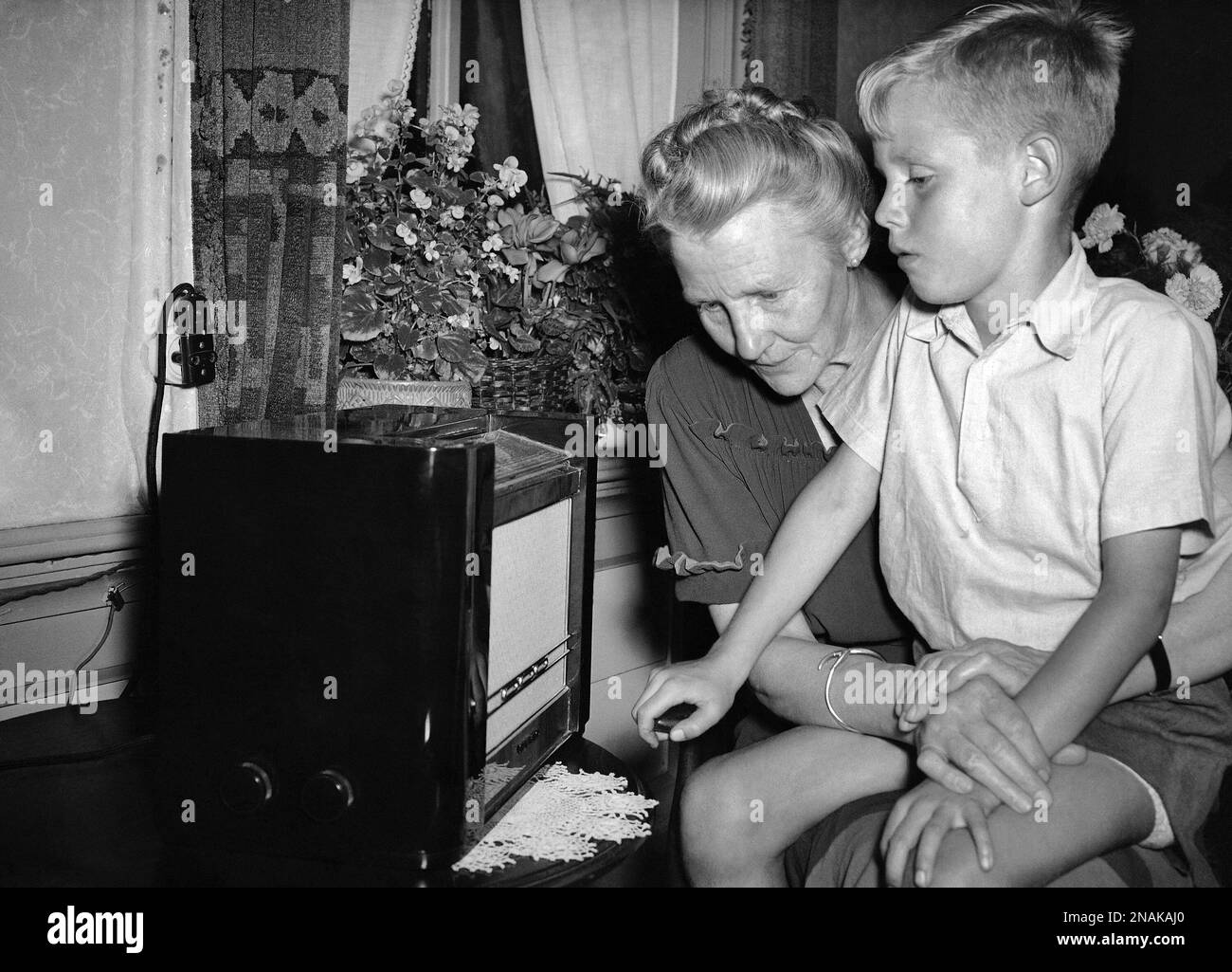 Six-year-old Jantje Blankers-Koen, sitting on the lap of his ...