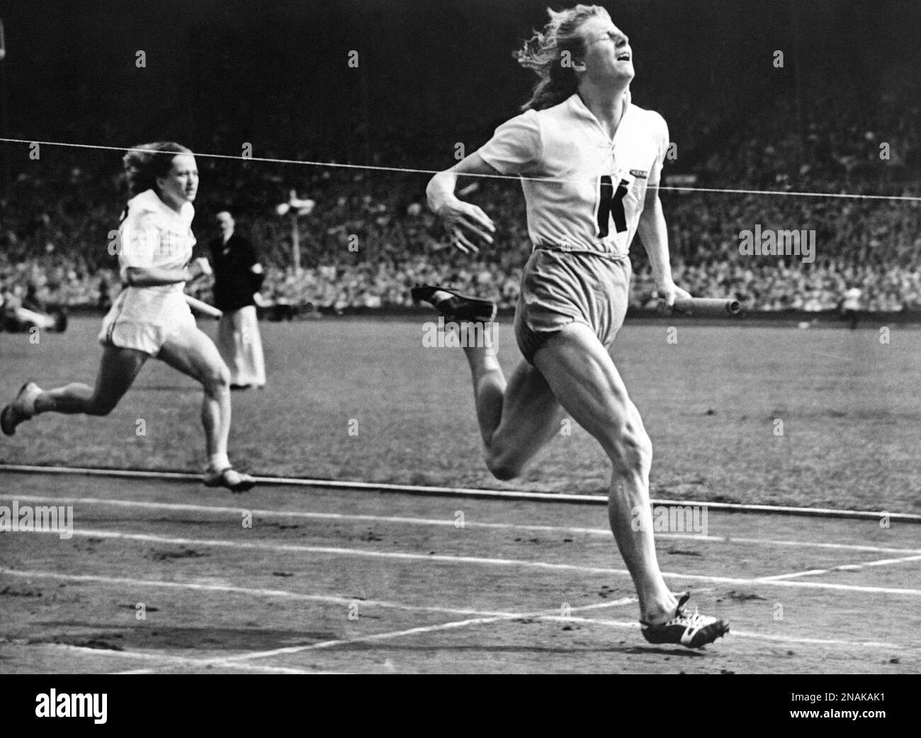 Mrs. Fanny Blankers-Koen, the Dutchwoman, winning the last lap of the ...