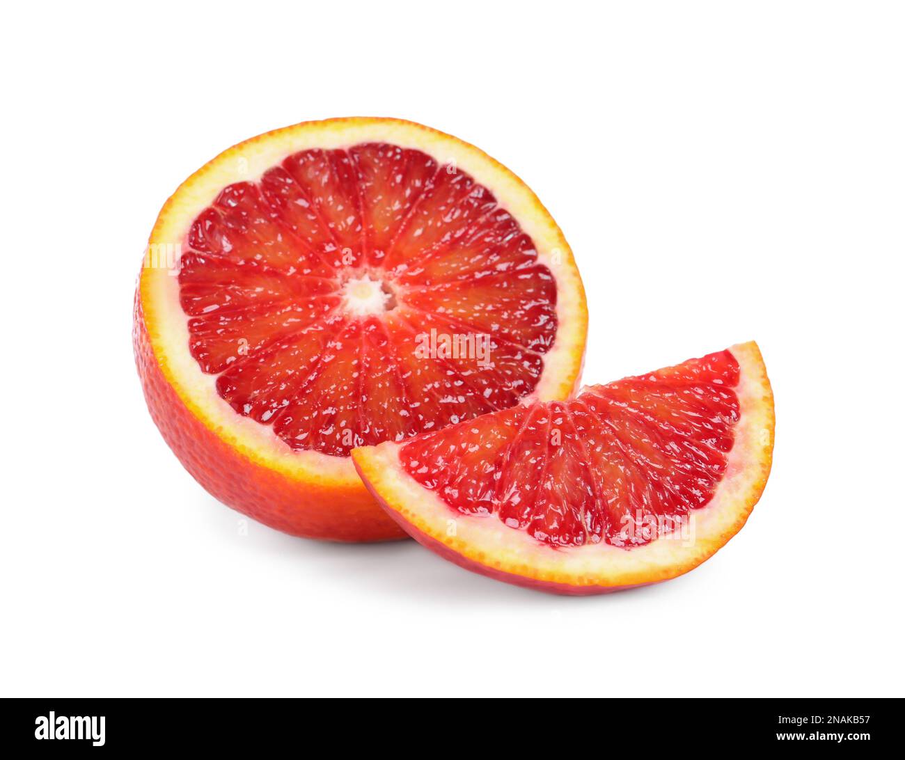 Cut ripe red orange isolated on white Stock Photo - Alamy
