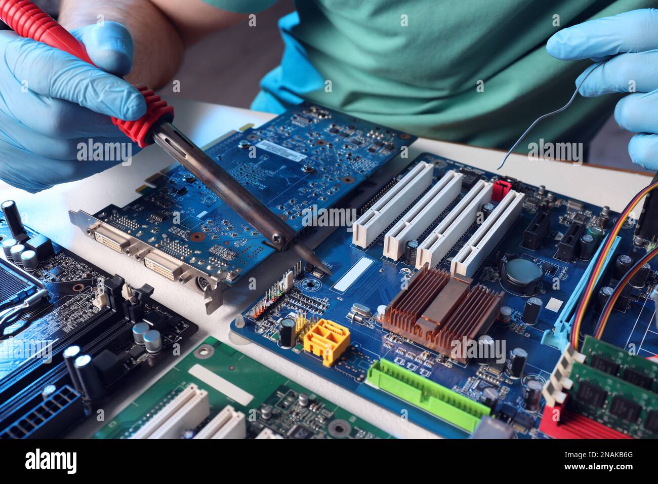 Technician electronic soldering repairing hi-res stock photography and ...