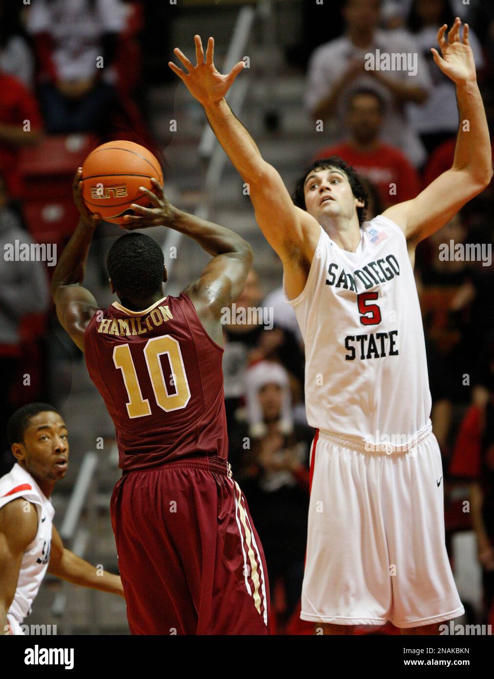 San Diego State's Garrett Green (5) pressures Elon's Austin Hamilton ...